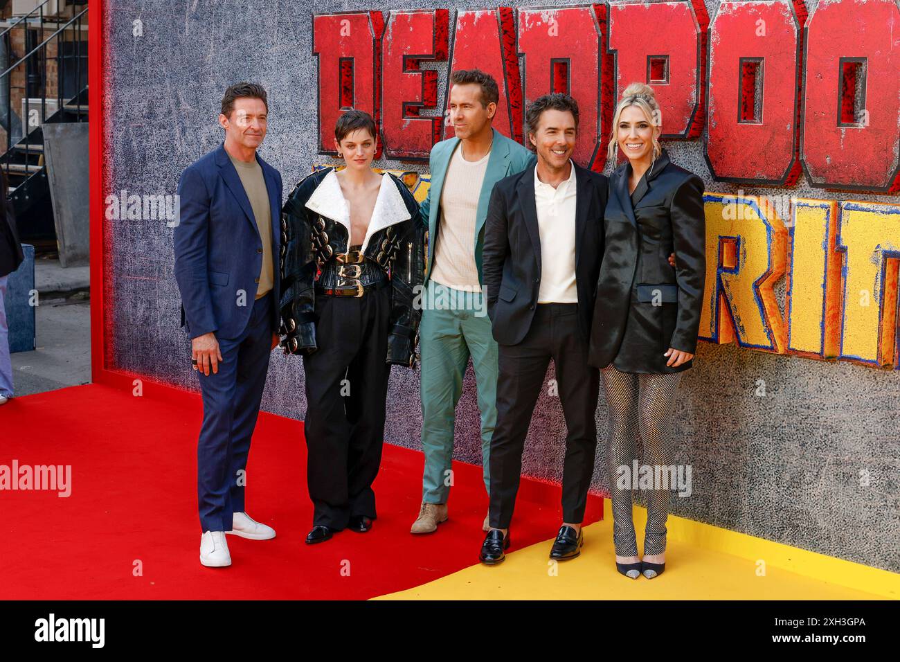 Ryan Reynolds, from left, Hugh Jackman, Emma Corrin, director Shawn ...