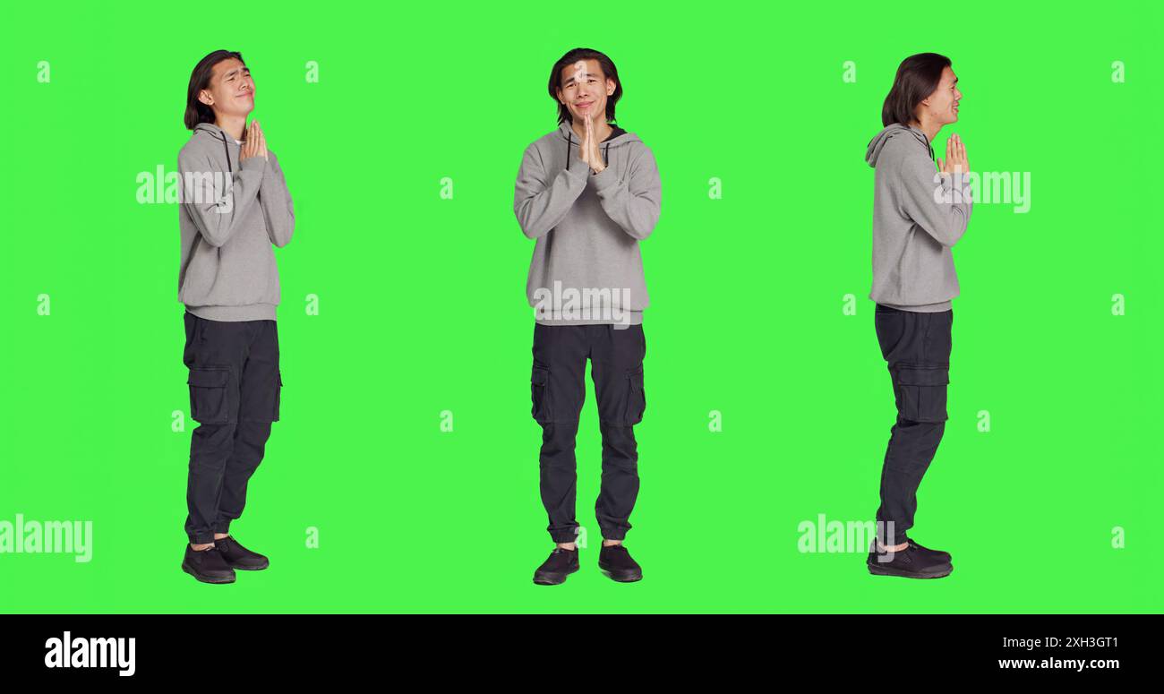 Male model praying to God on camera and doing prayer hands sign ...