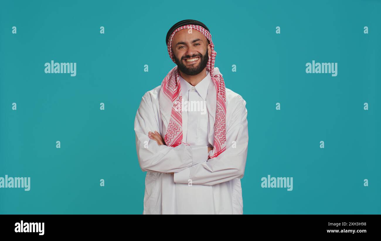 In the studio, islamic person says yes and nods, indicating support and ...