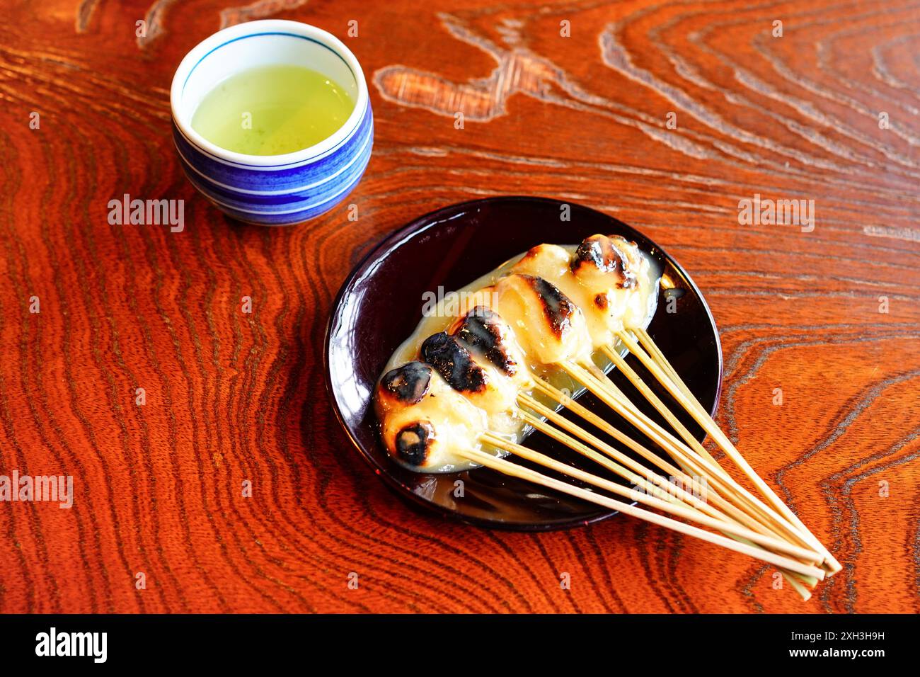 Aburi Mochi, Kyoto's famous mochi sweets baked on bamboo skewers Stock ...