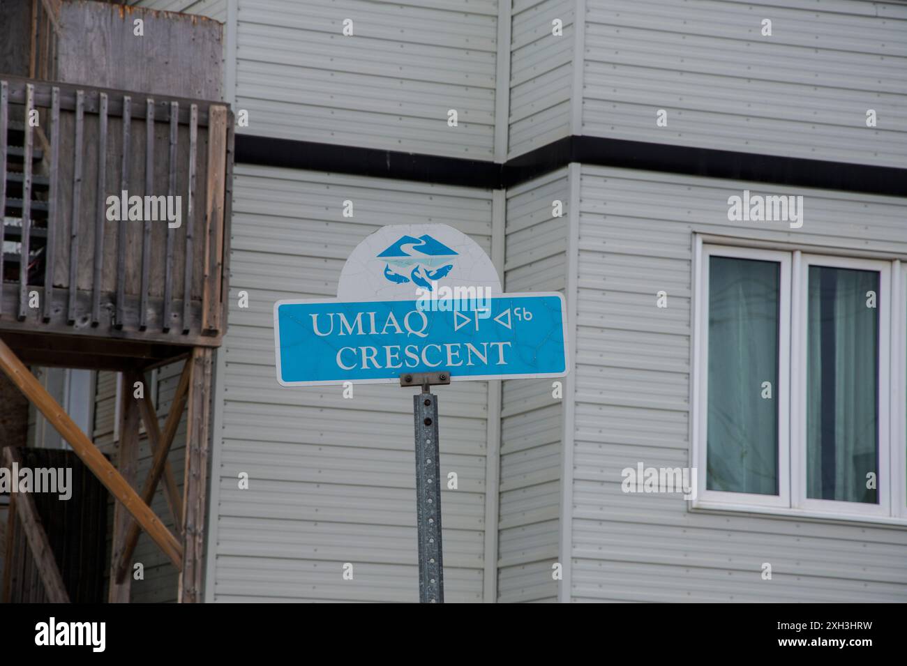 Bilingual Umiaq Crescent sign in English and Inuktitut in Iqaluit ...