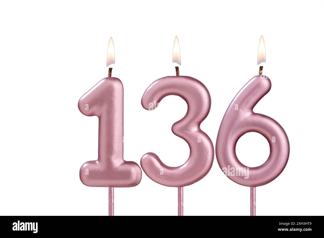 Lit birthday candle - Candle number 136 on white background Stock Photo ...