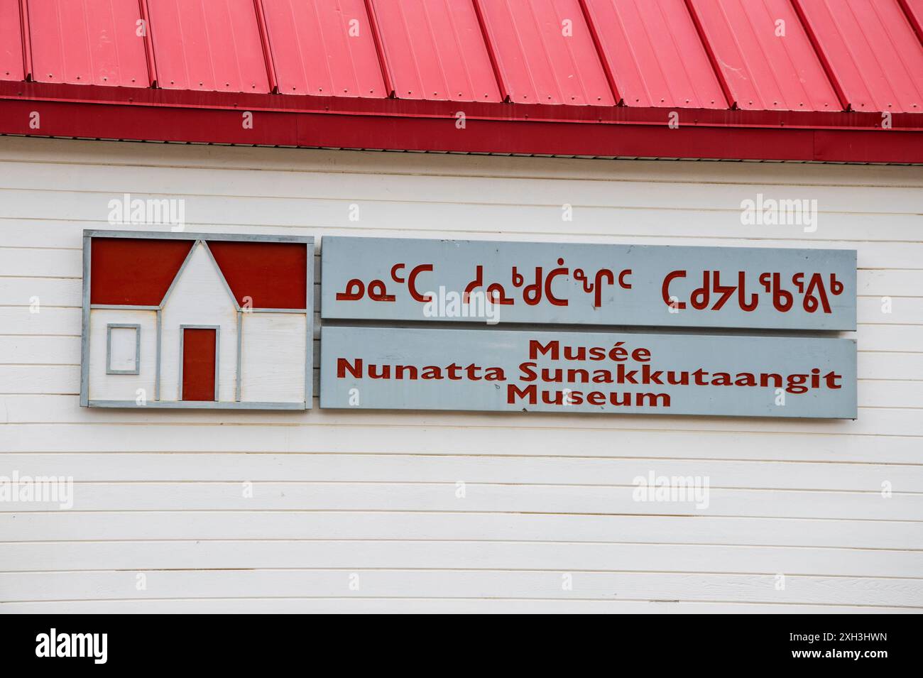 Multilingual Nunatta Sunakkutaangit Museum sign in English, French and ...