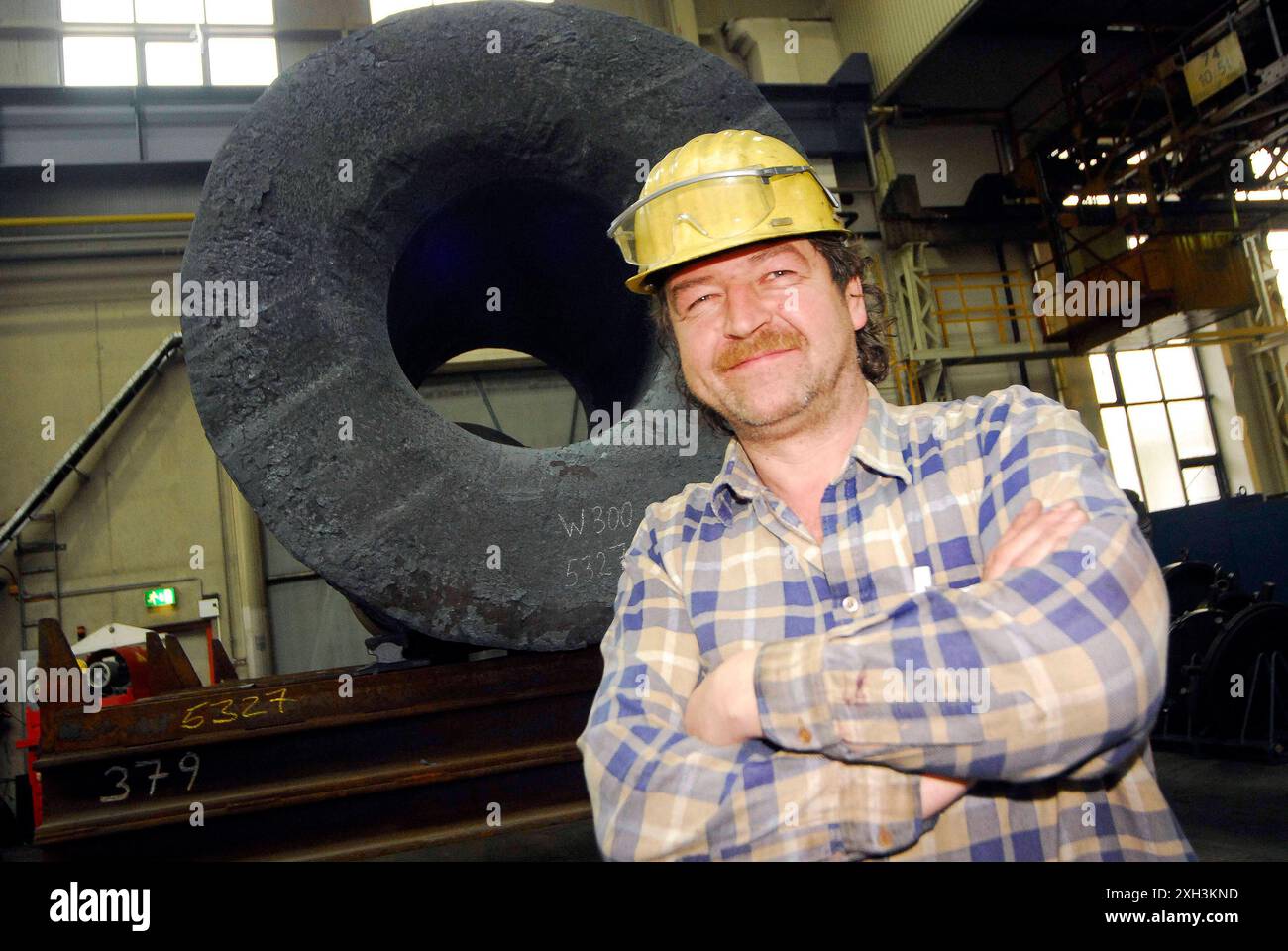 working and producing in a plant in the iron industry working in the ...