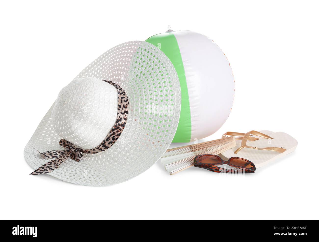 Stylish beach hat, ball, flip flops, fan and sunglasses on white ...