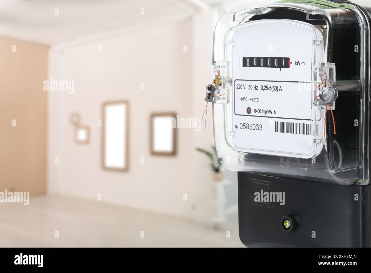 Electricity meter indoors, space for text. Measuring device Stock Photo ...