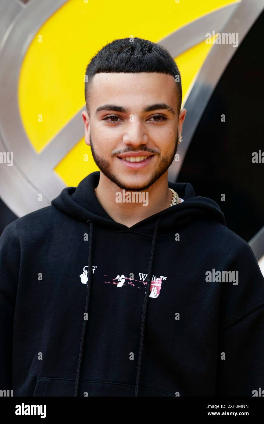 Junior Andre poses for photographers upon arrival at the screening of ...