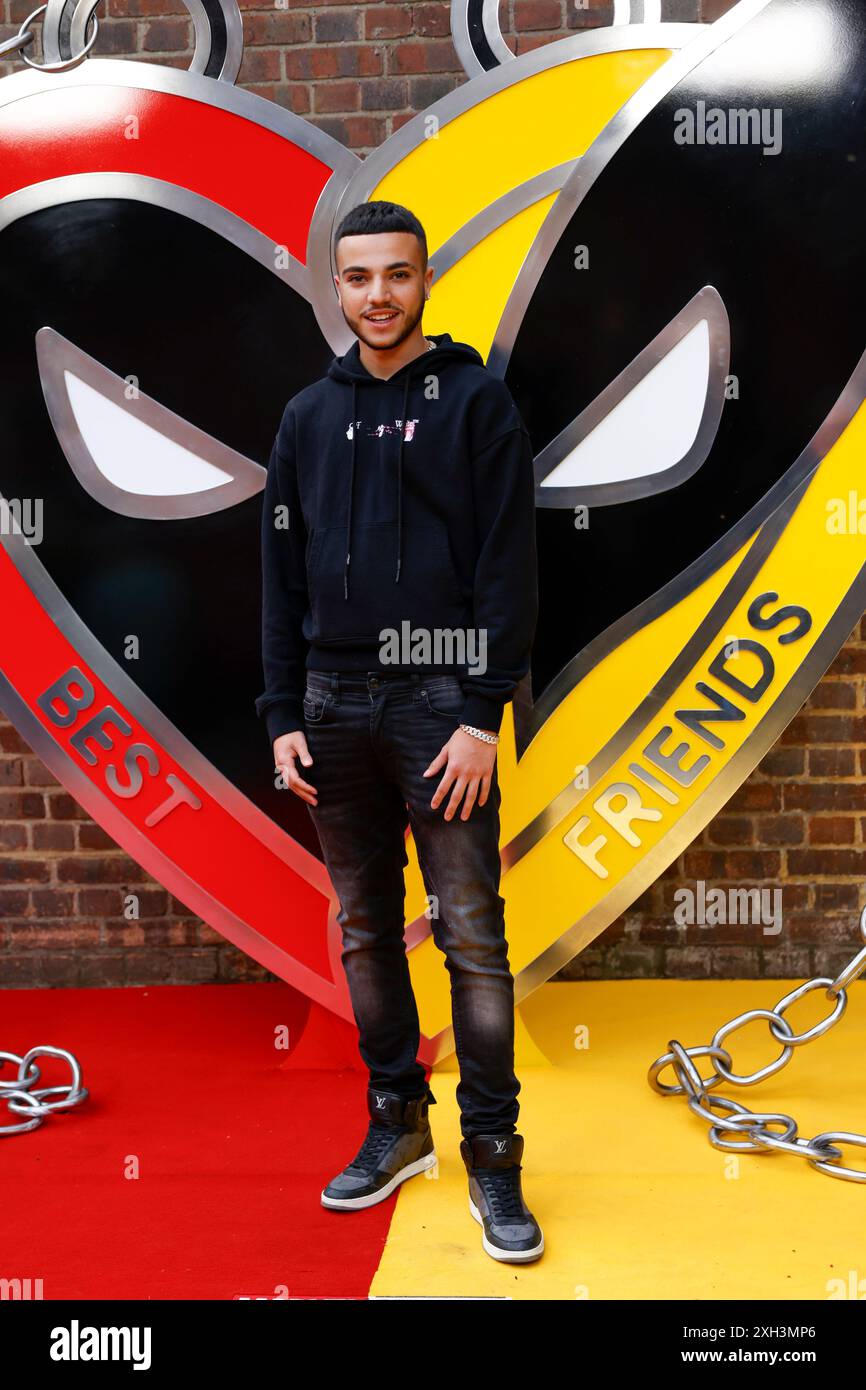 Junior Andre poses for photographers upon arrival at the screening of ...