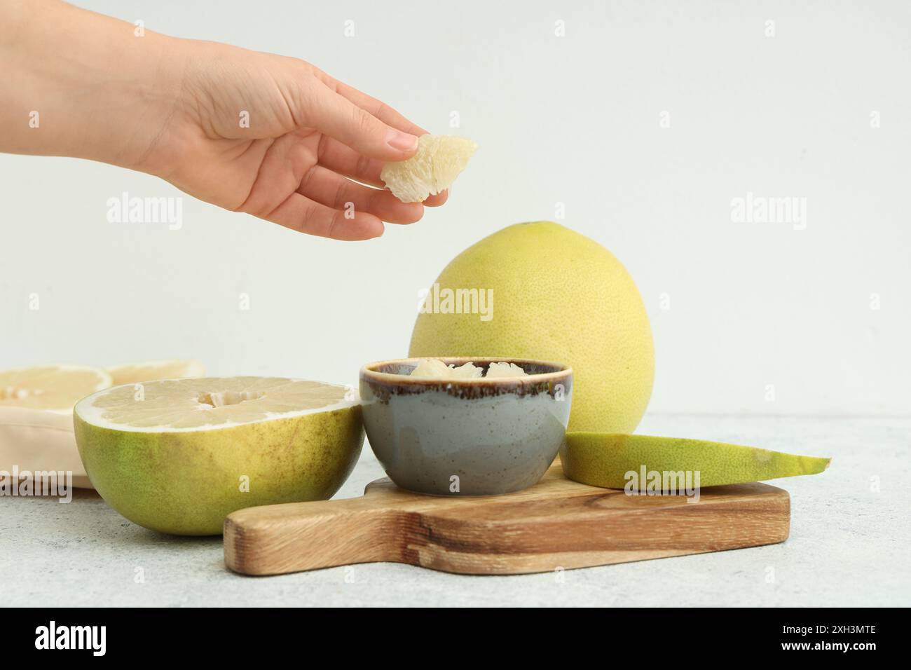 Woman tasty fresh pomelo hi-res stock photography and images - Alamy
