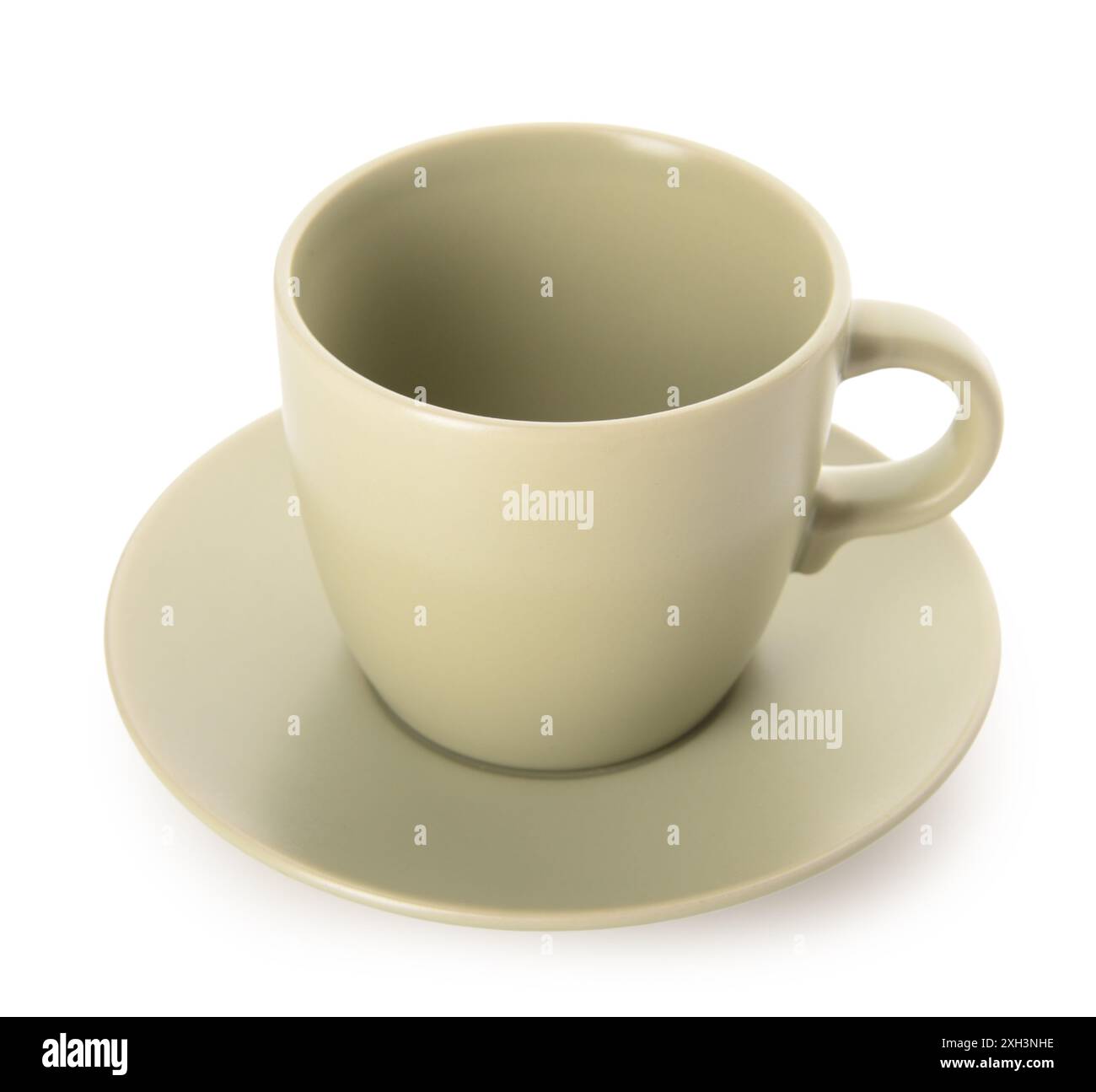 Ceramic olive cup with saucer on white background Stock Photo - Alamy