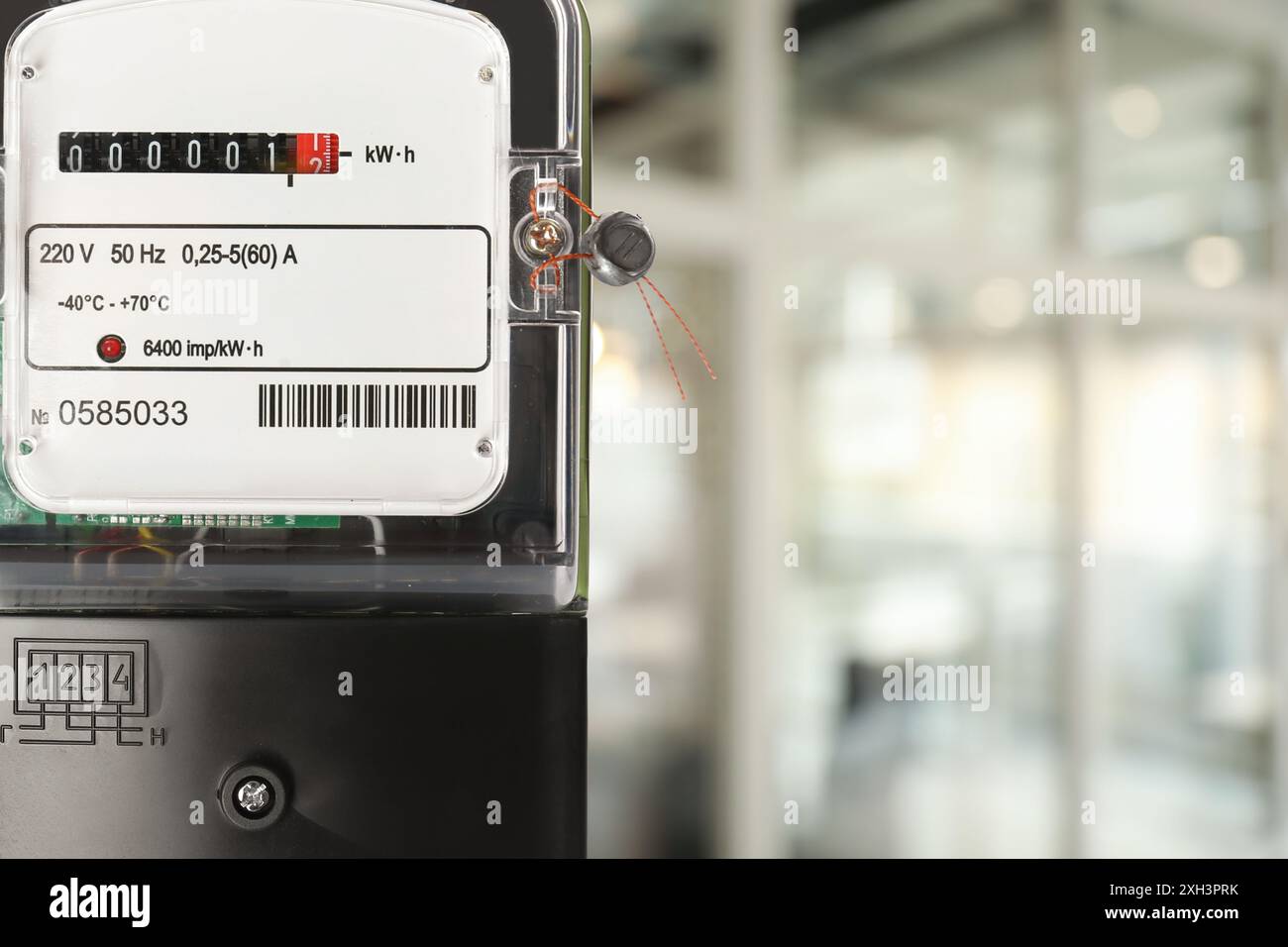 Electricity meter indoors, space for text. Measuring device Stock Photo ...