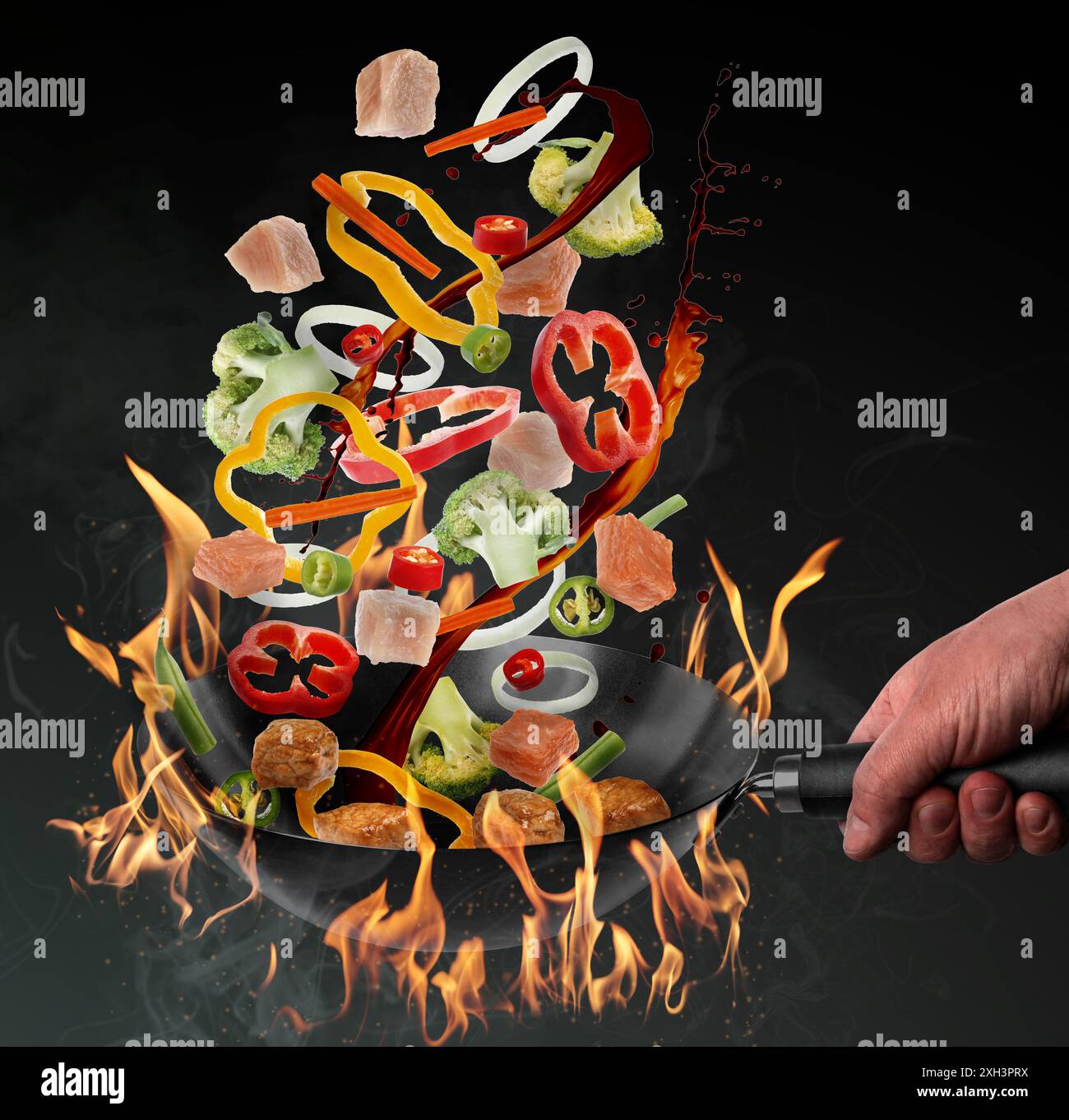 Black pepper hand slow motion hi-res stock photography and images - Alamy