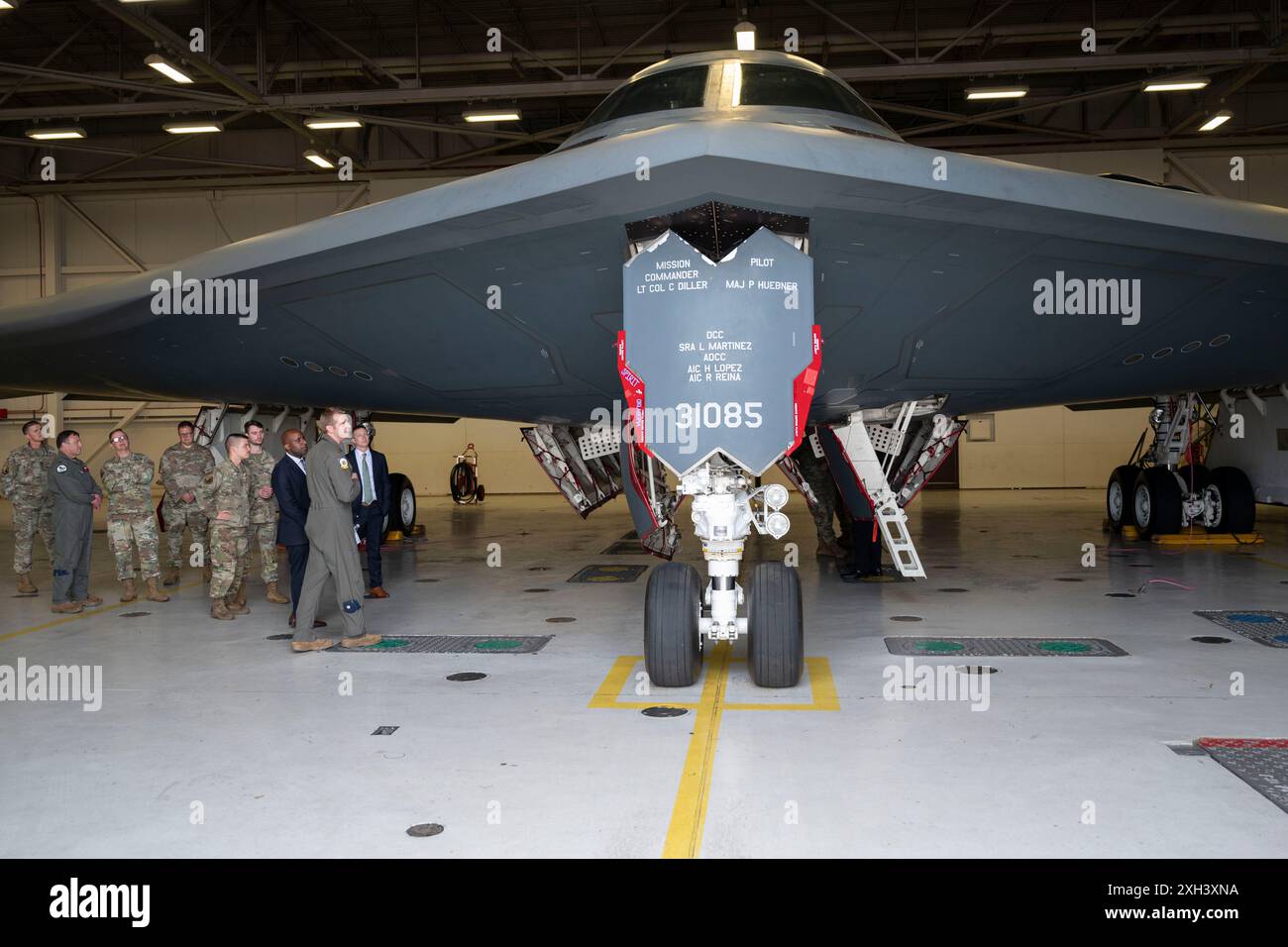 U.S. Airmen assigned to the 509th Bomb Wing give a B-2 Spirit stealth ...