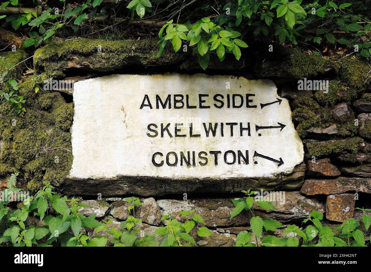 Old road sign directions to Ambleside, Skelwith, Coniston at Red Bank ...