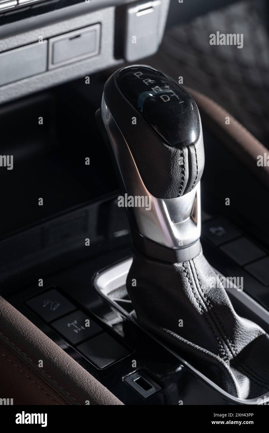 Automatic gearstick with leather cover macro close up view Stock Photo ...