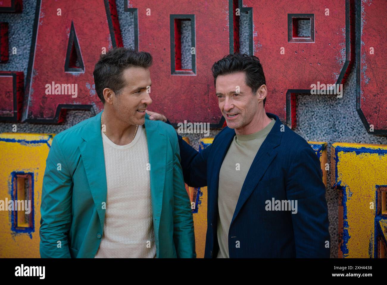 London, UK. 11th July 2024. Cast members Ryan Reynolds (L) and Hugh ...