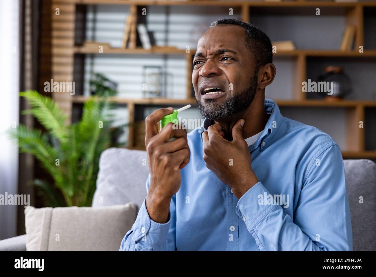 Handsome black male patient experiencing hi-res stock photography and ...