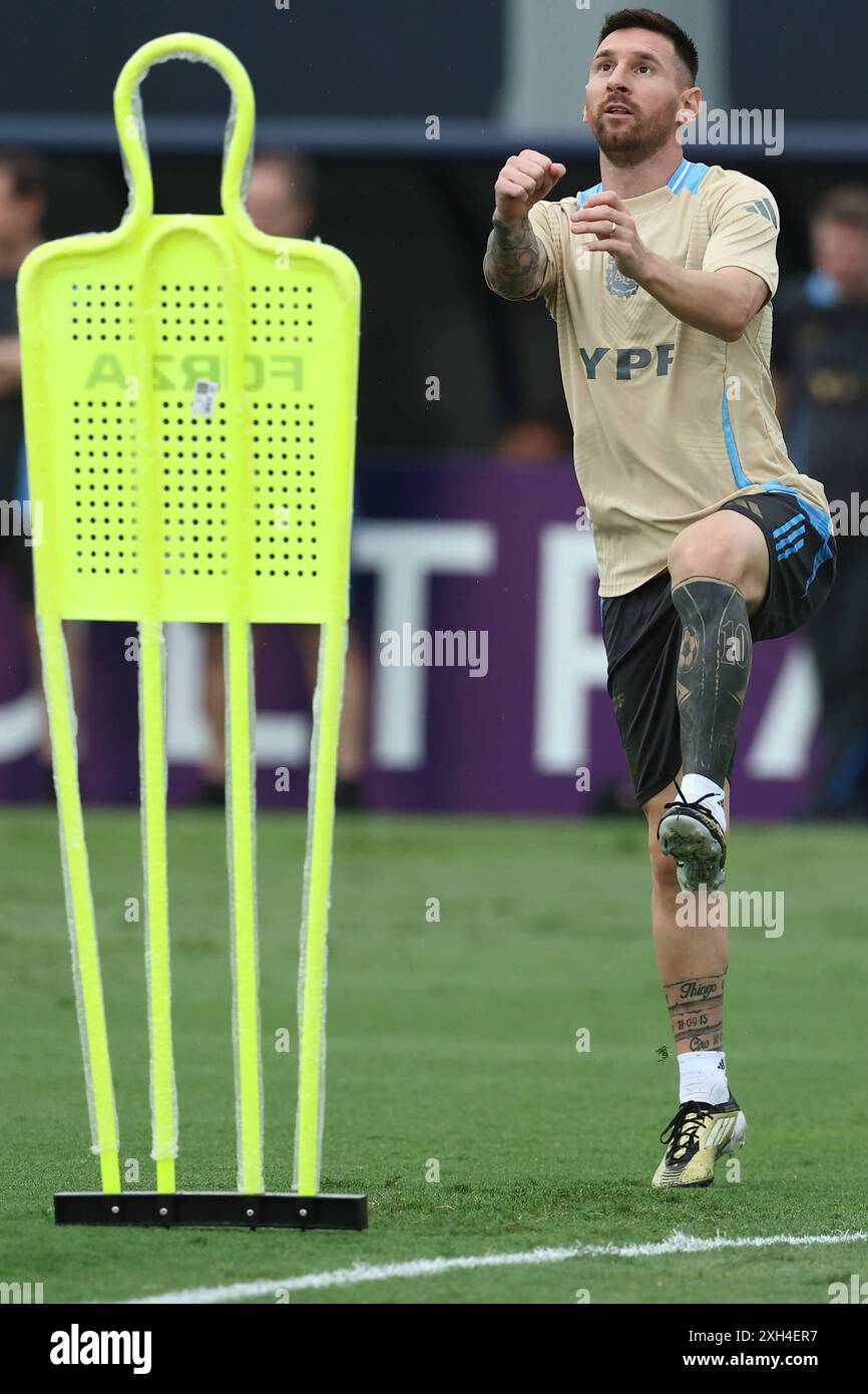 Argentina s forward Lionel Messi jumps during a training session ahead ...