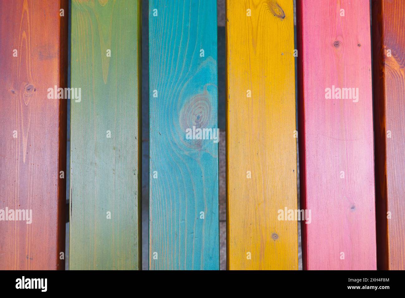 Rainbow wooden table outdoors with ashtray, hardwood and wood stain ...