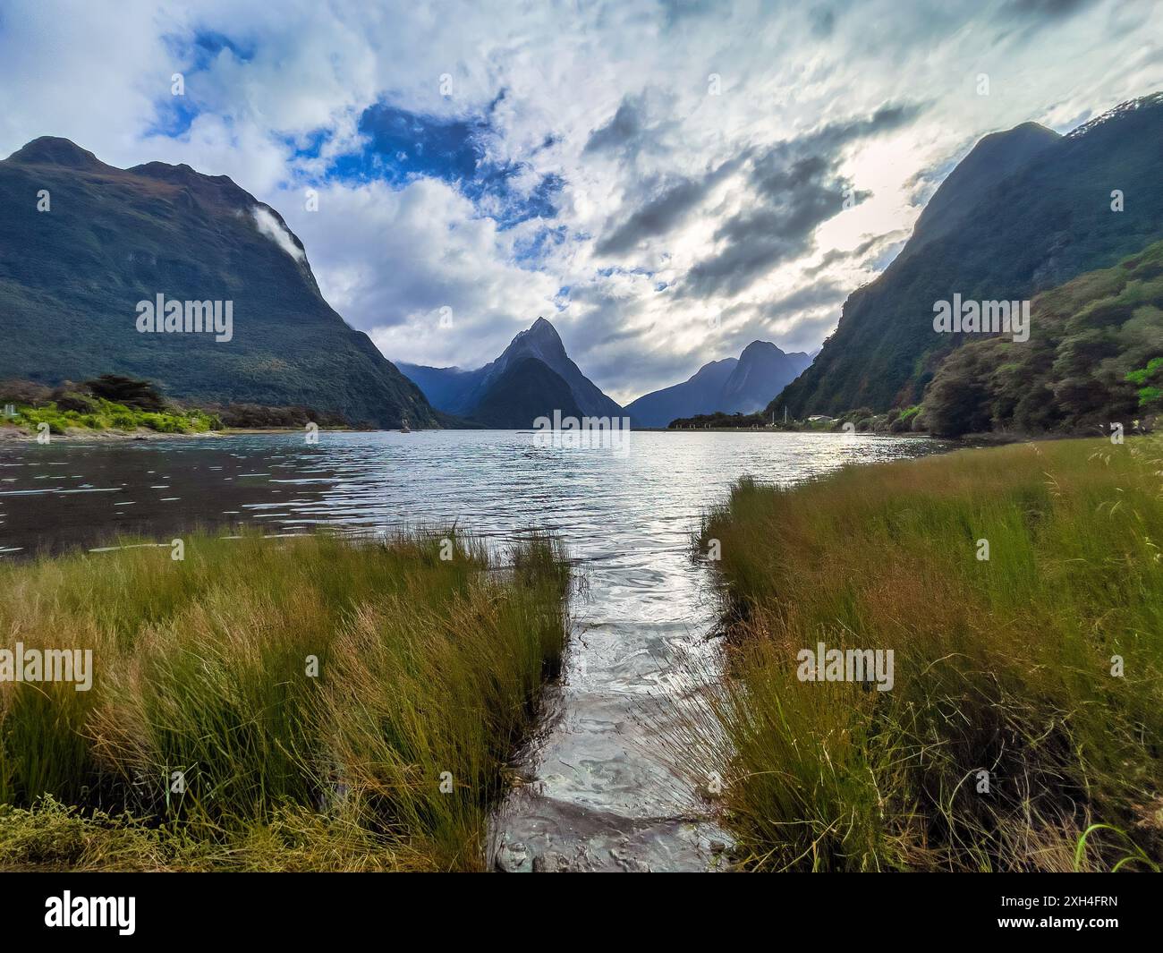 Steam of water acting as a leading line to Mitre Peak at Milford Sound ...