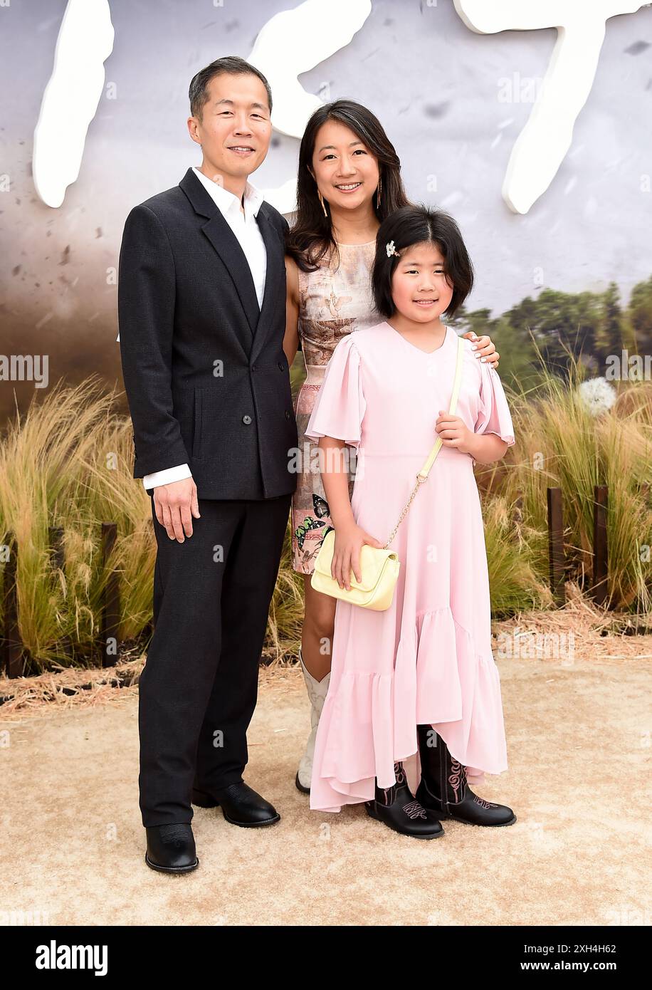 Lee Isaac Chung, Valerie Chung and daughter arriving to the Los Angeles ...