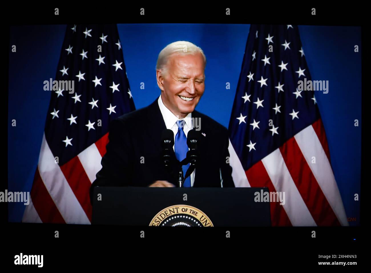 In this photo illustration, a screen shows the current US President Joe ...