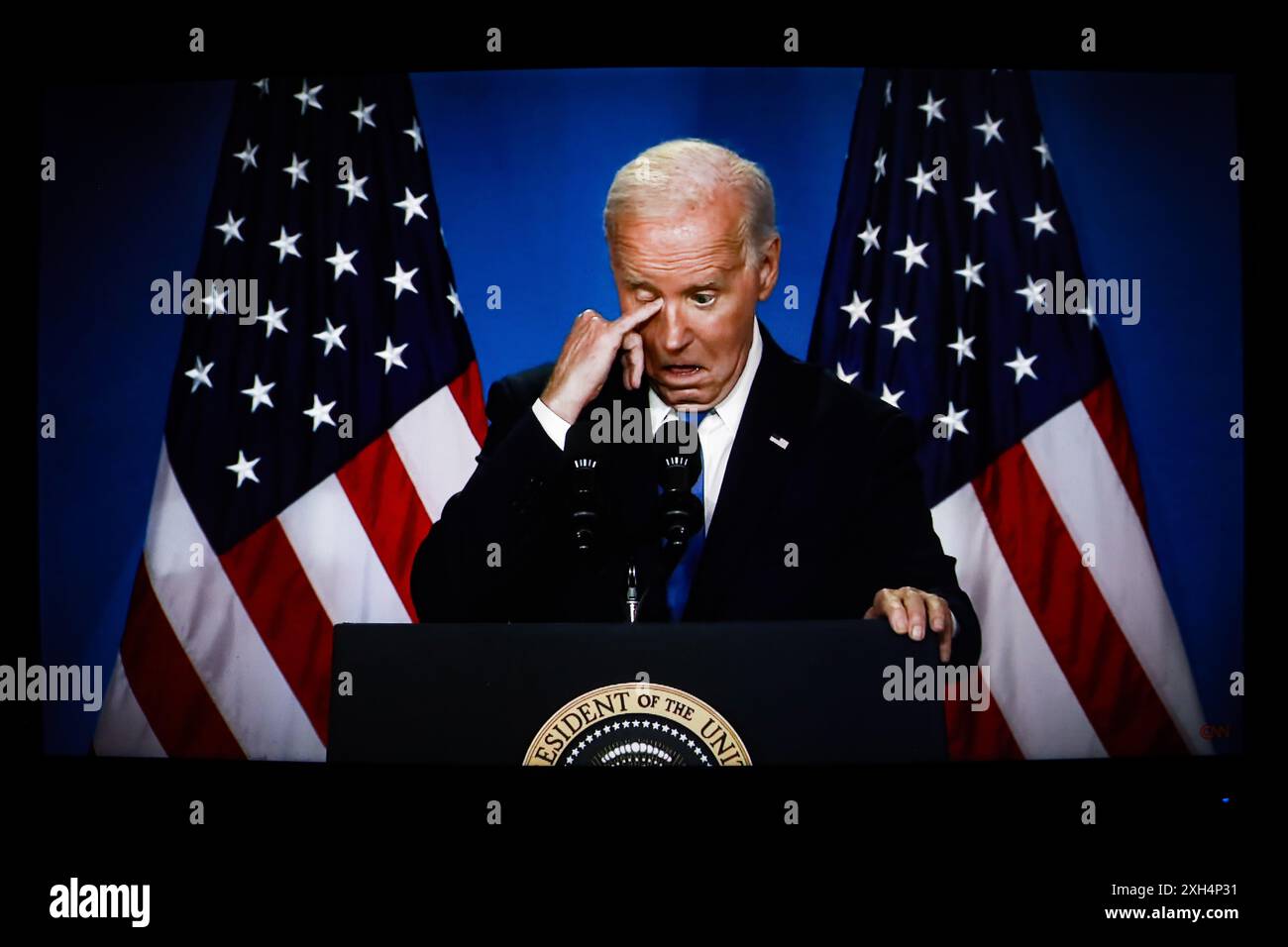 In this photo illustration, a screen shows the current US President Joe ...