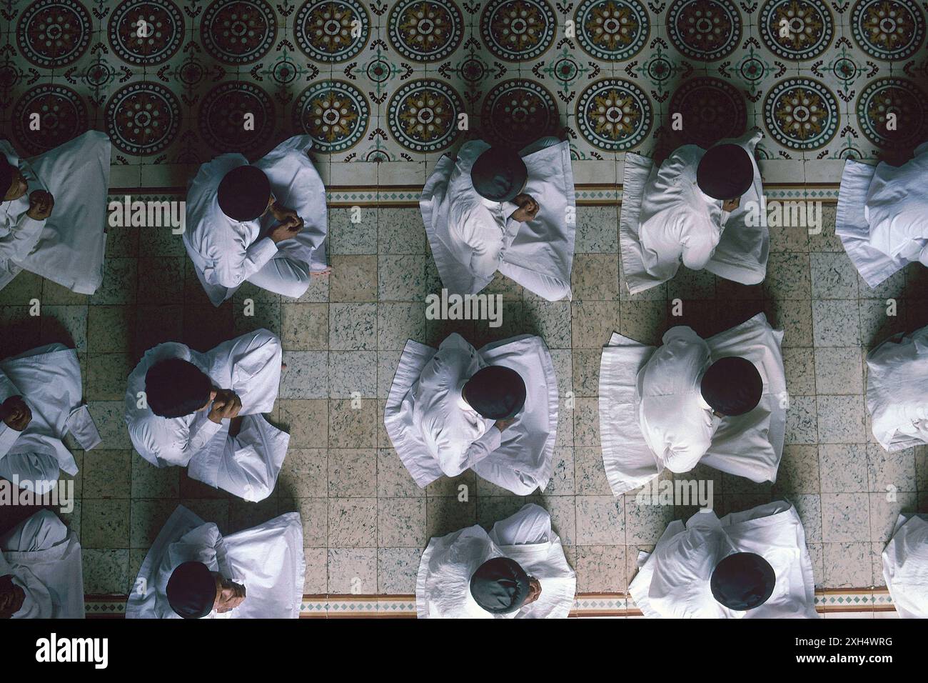 Male Caodaist disciples sitting during ceremony, taken in 1995, Cao Dai ...