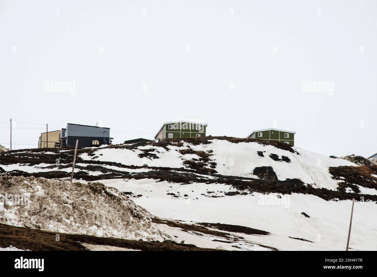 View of the apartment buildings on the hill from Qajisarvik Road in ...