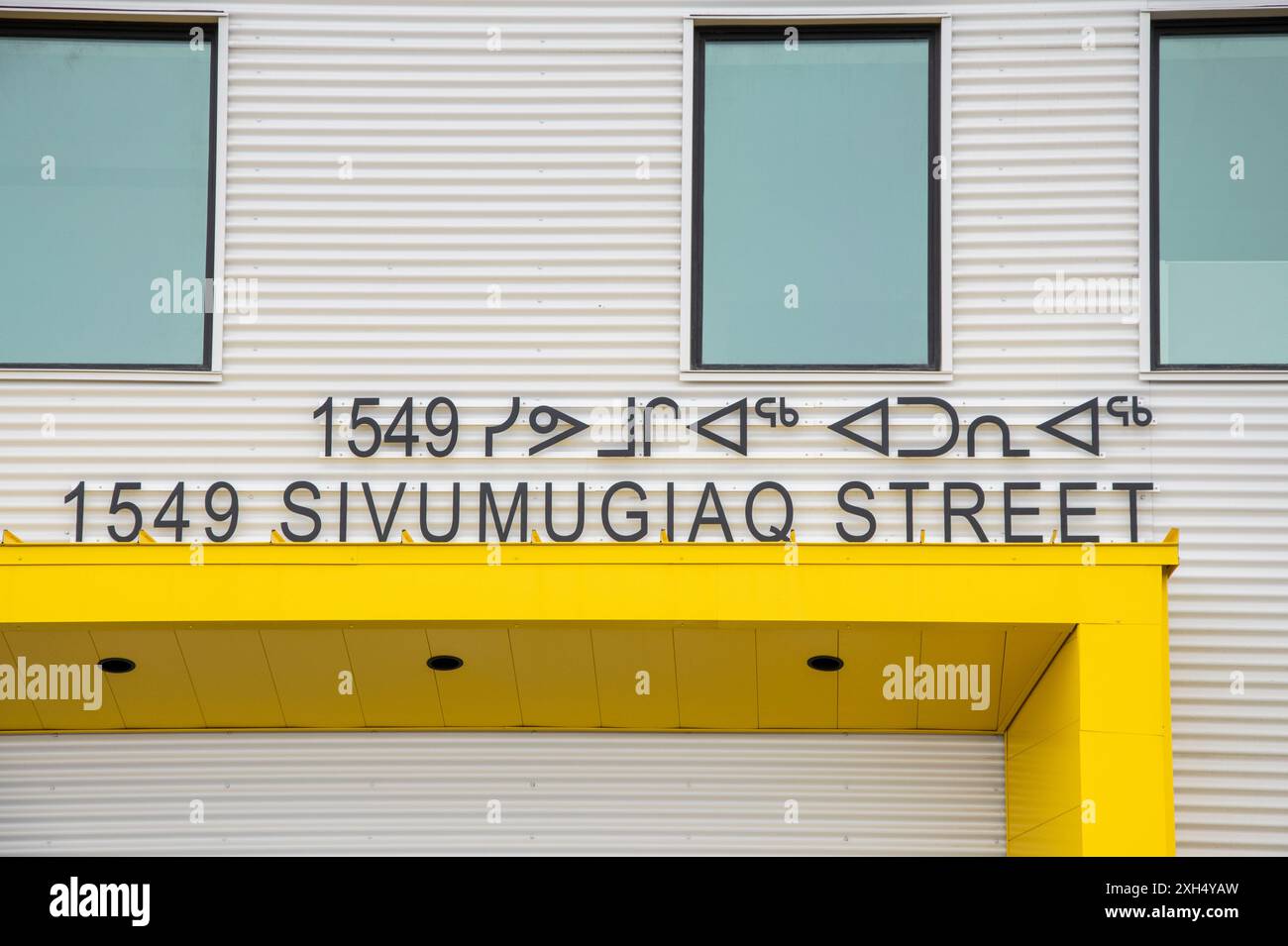 Bilingual City of Iqaluit Operations Centre address sign in English and ...