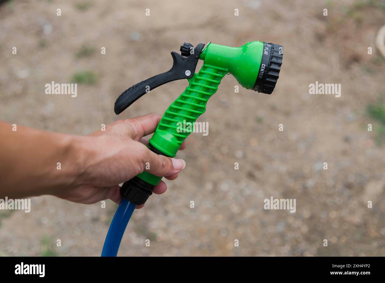 Plastic Trigger Nozzle for spray the water to the tree Stock Photo - Alamy