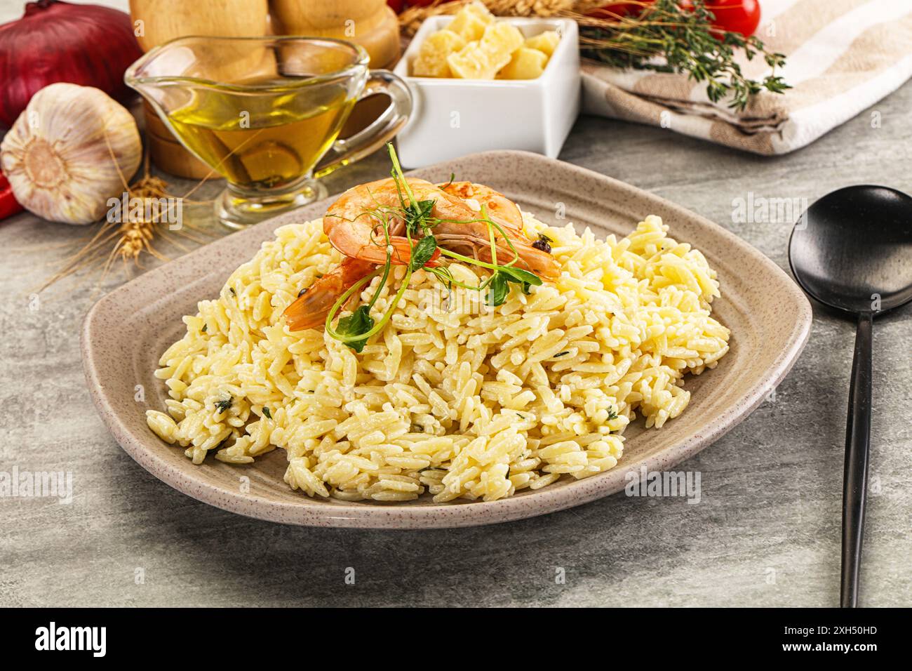 Italian pasta Orzo with prawn and parmesan cheese Stock Photo - Alamy