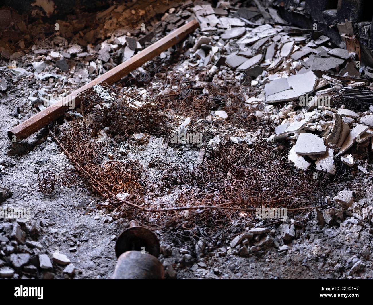 The remains of a mattress are seen in the scorched bedroom of hostage ...