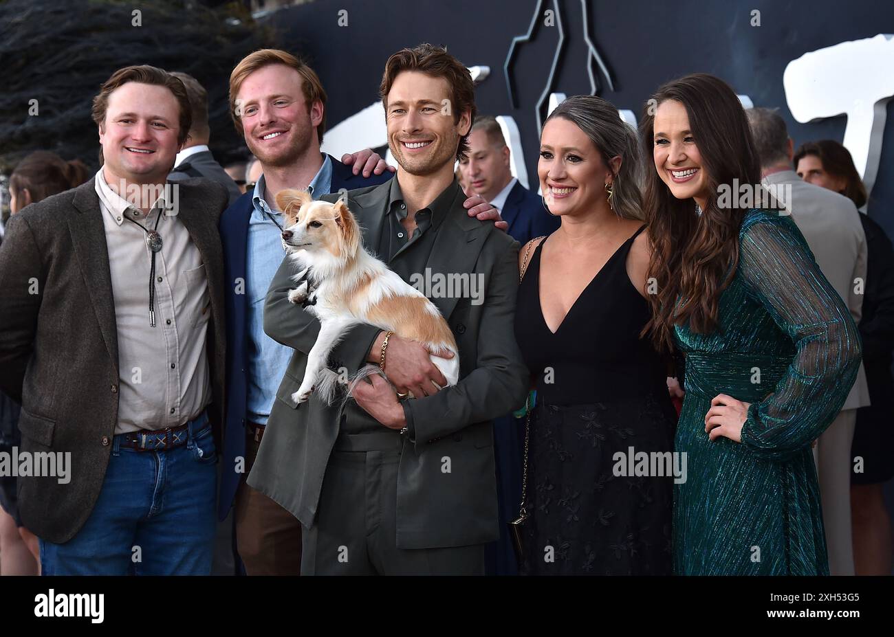Glen Powell and Family arriving to the Los Angeles premiere of ...