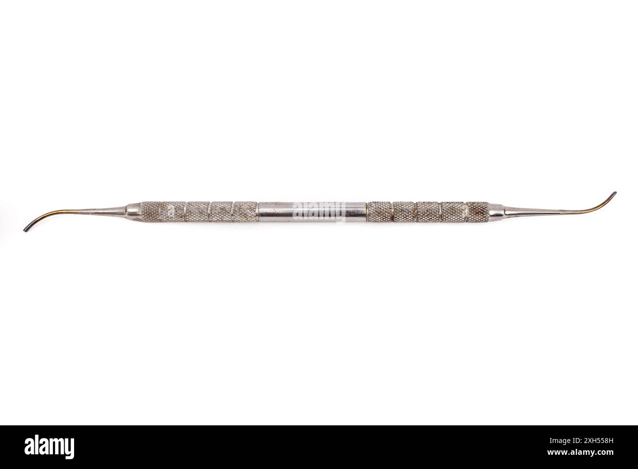 Old, dirty and rusted dentist tool, isolated on white Stock Photo - Alamy