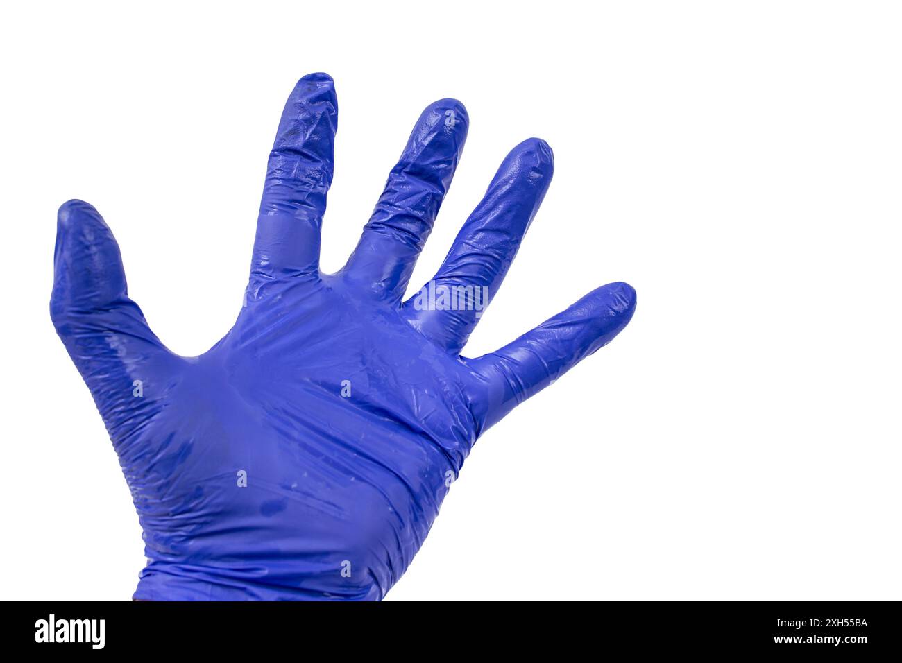 Hand with spread fingers and blue latex glove isolated on white ...
