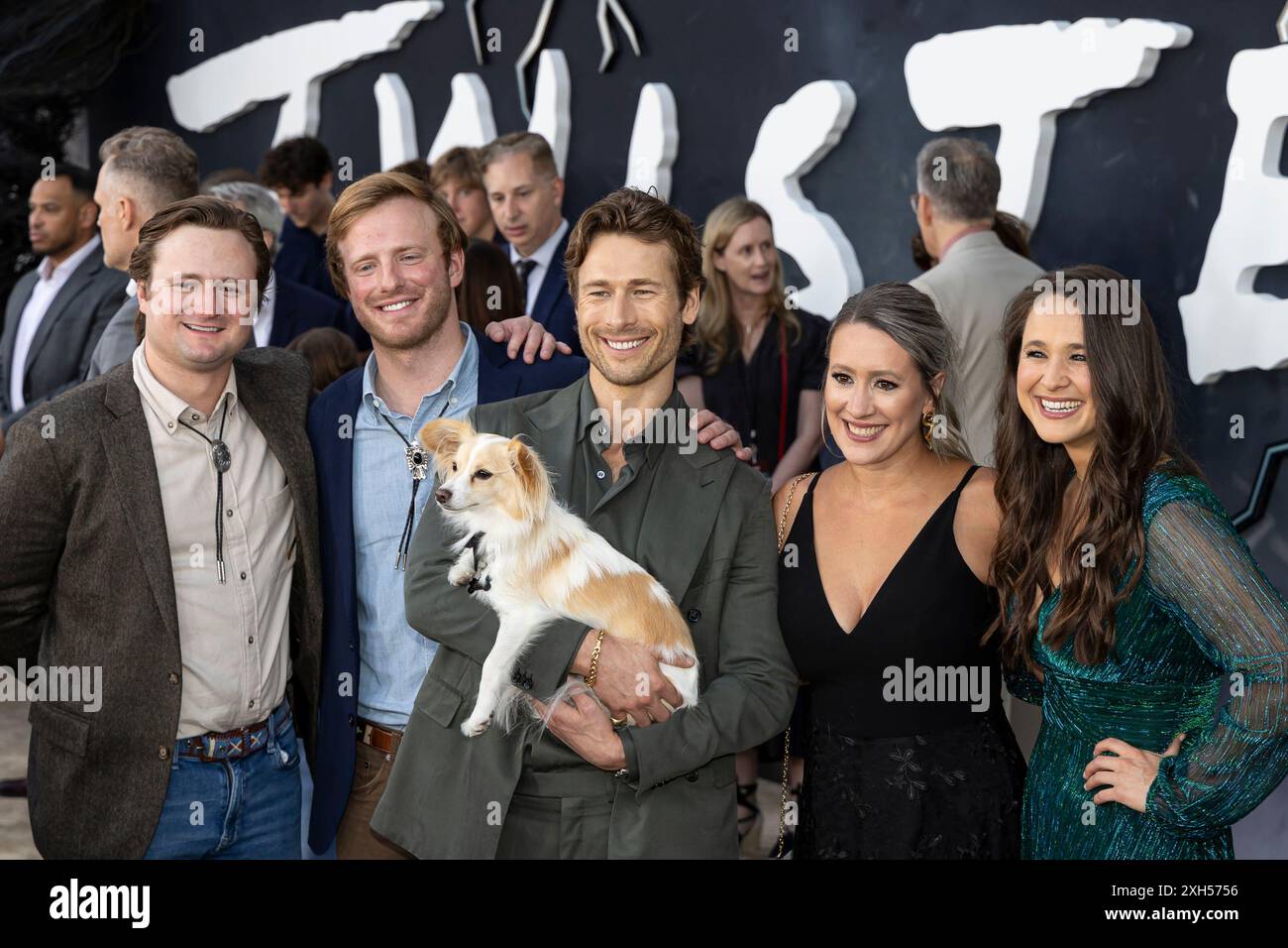 Los Angeles, USA. 11th July, 2024. Guests, Glen Powell, Brisket the Dog, Lauren Powell Whatton ...