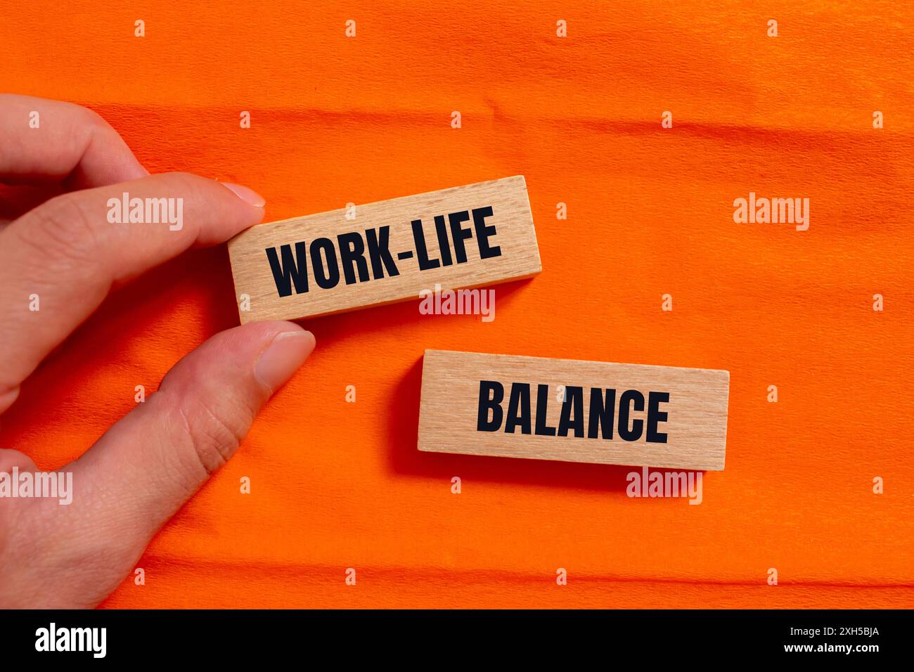 Work life balance message written on wooden blocks with orange ...