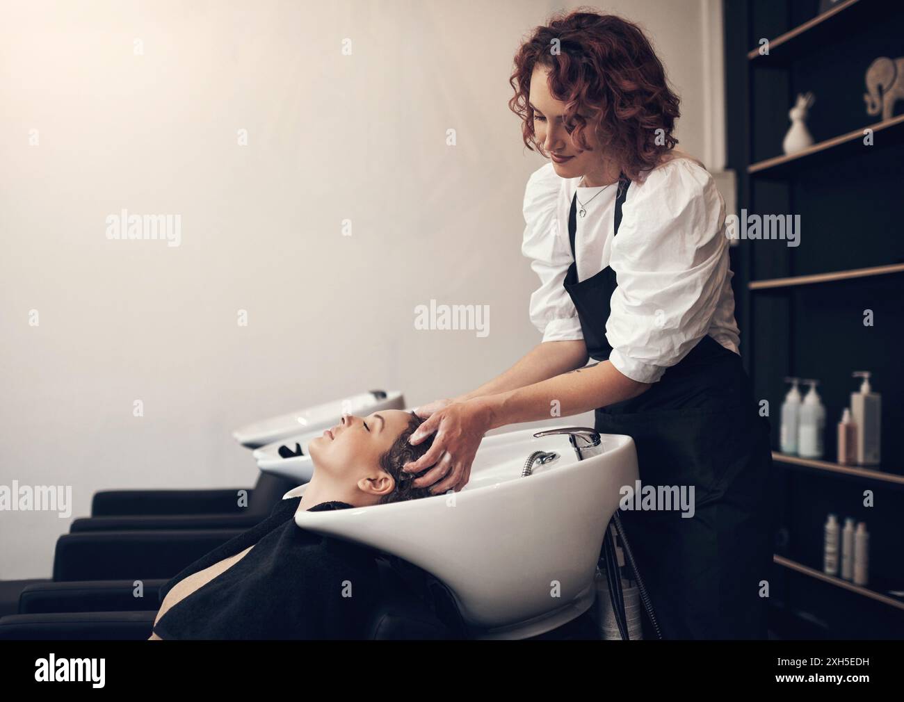 Wash, massage and shampoo for customer hair care, hairdresser and ...