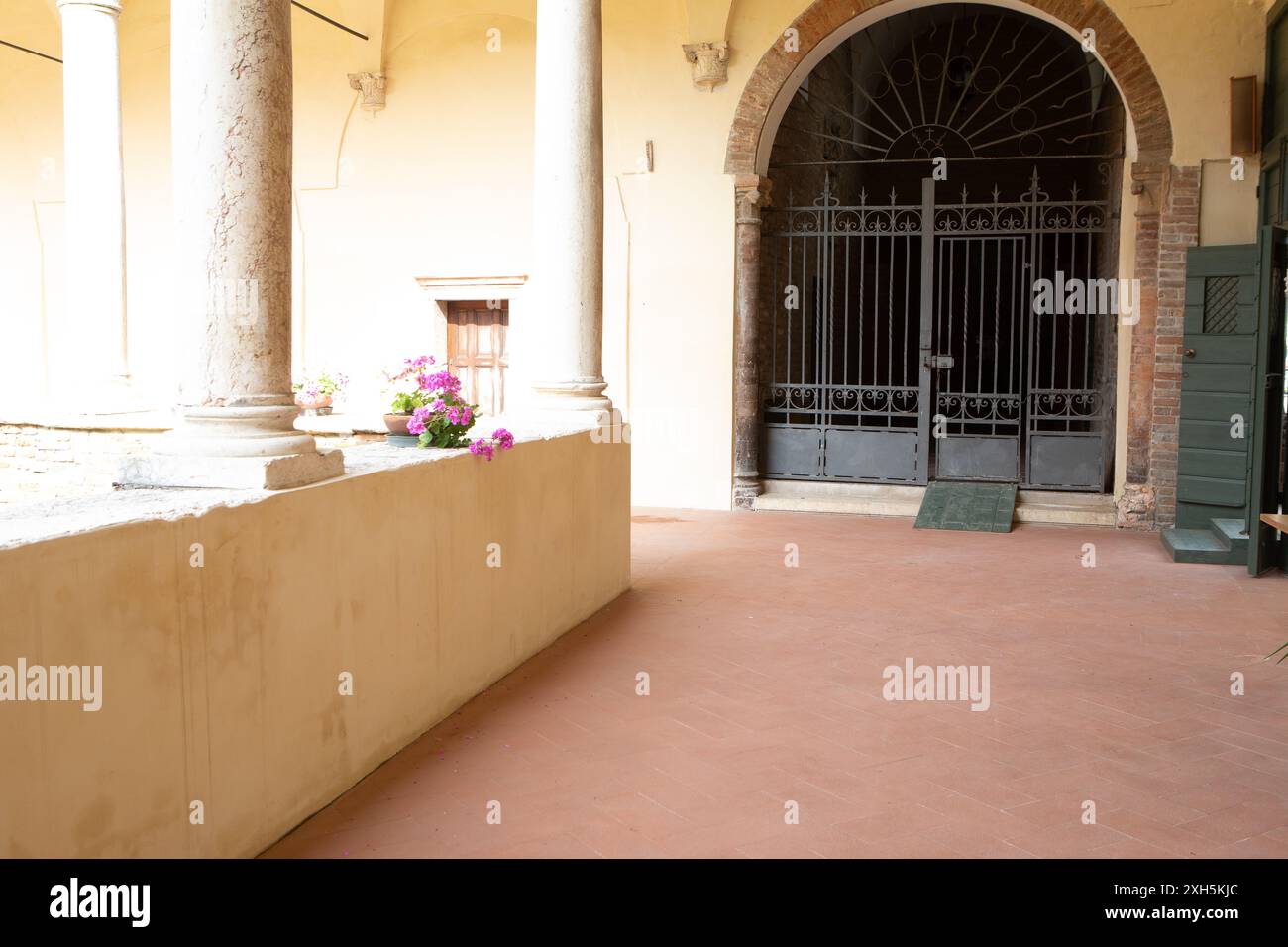 Architectural detail showing a typical italian cloister with columns ...