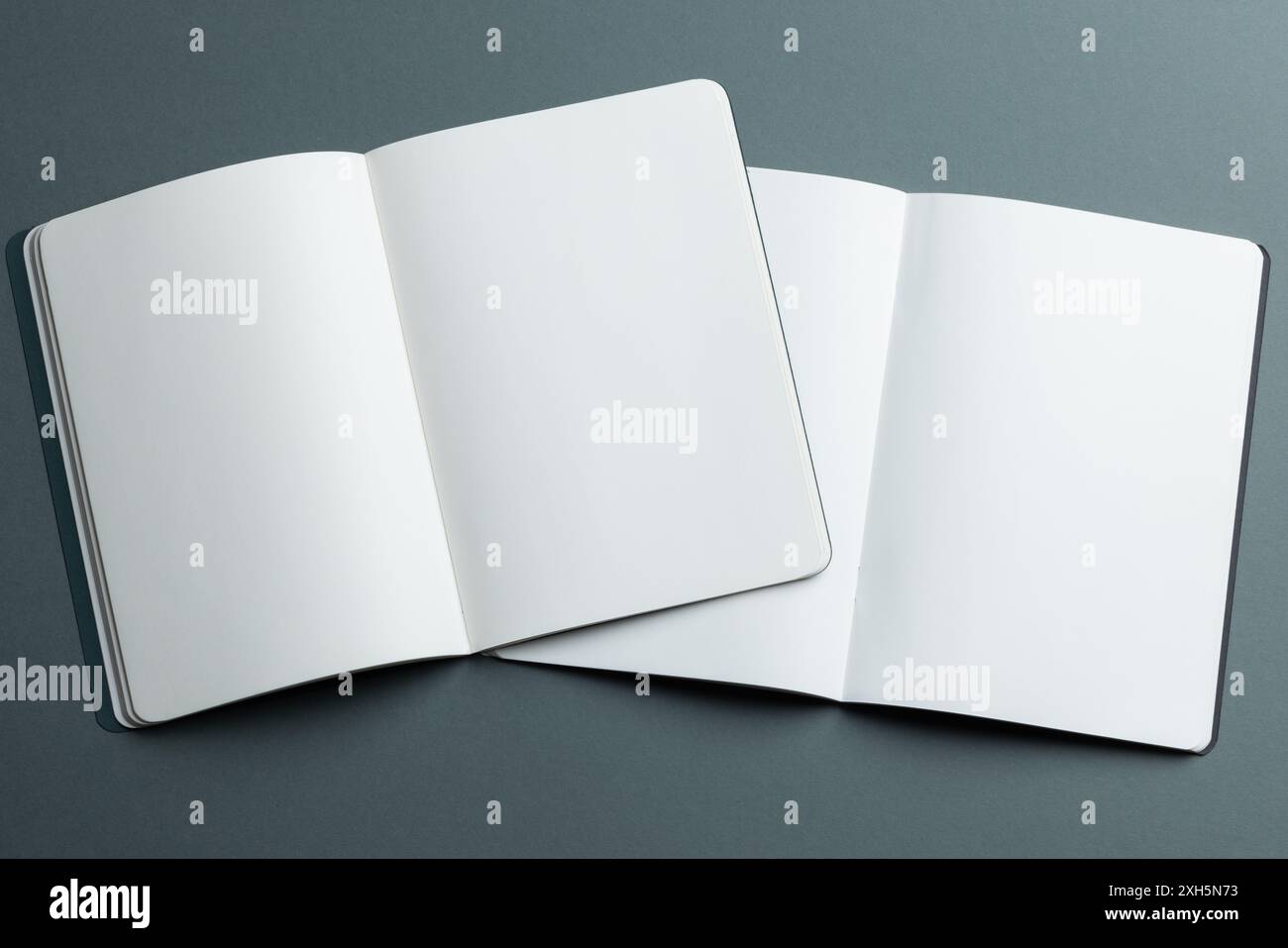 An open blank notebook lies on a flat surface, with copy space. Ideal ...