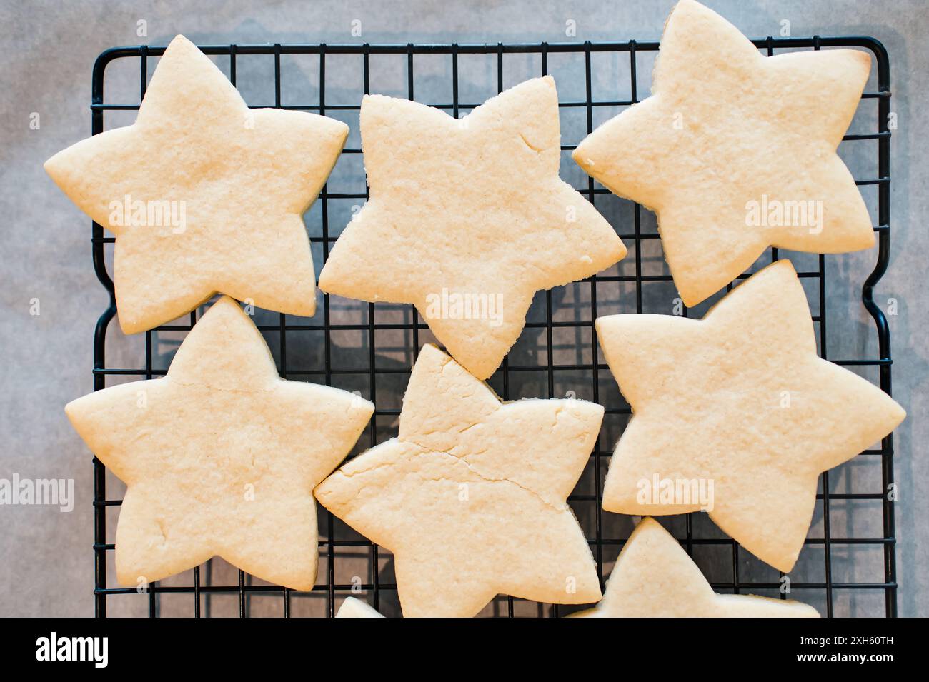 Star shaped sugar cookies cooling on a tray Stock Photo - Alamy