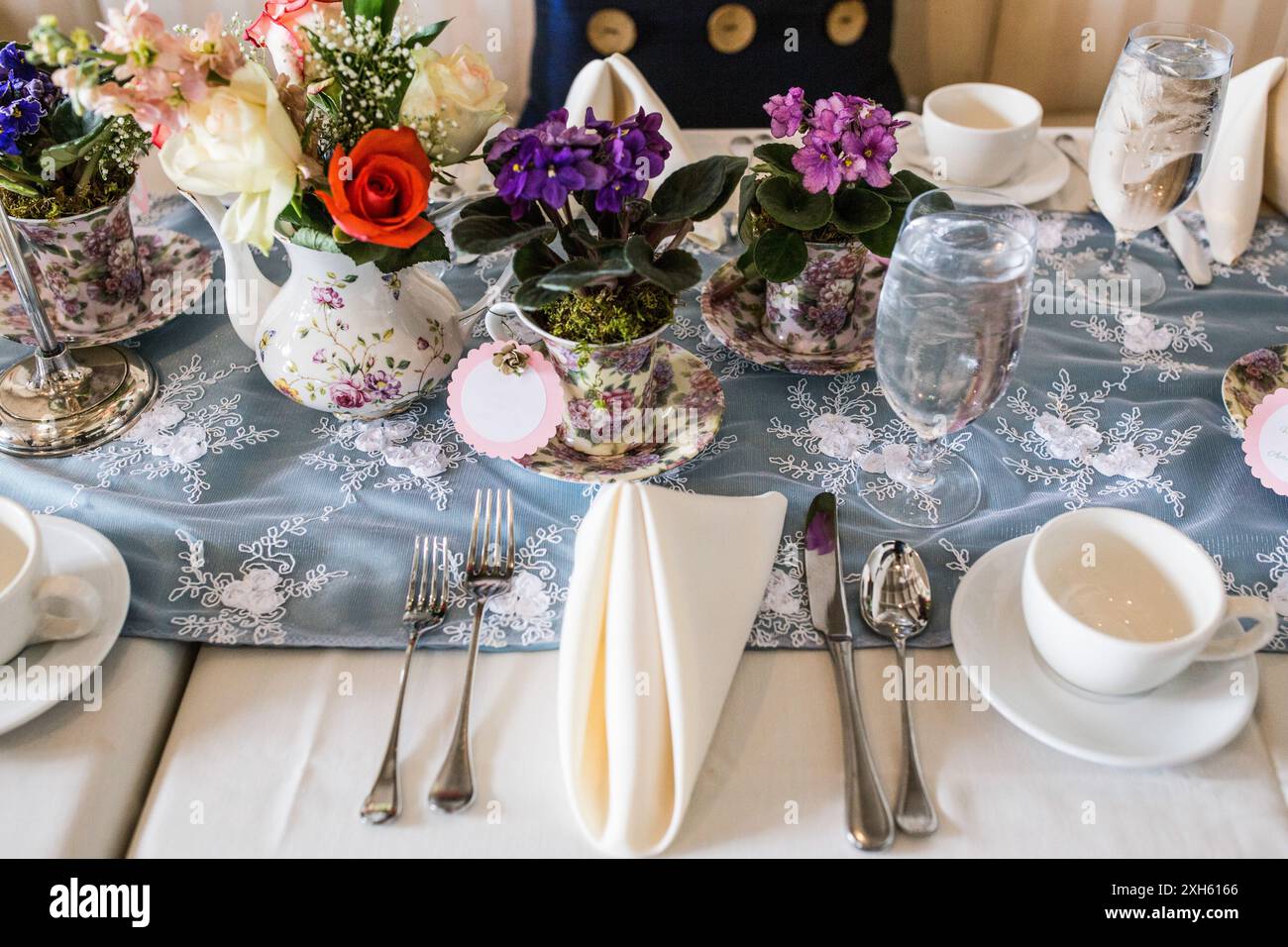 Floral teapot & teacup centerpieces on bridal shower table Stock Photo ...
