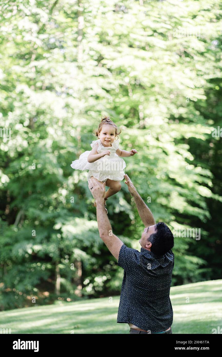 Flying with Dad in Nature Stock Photo - Alamy