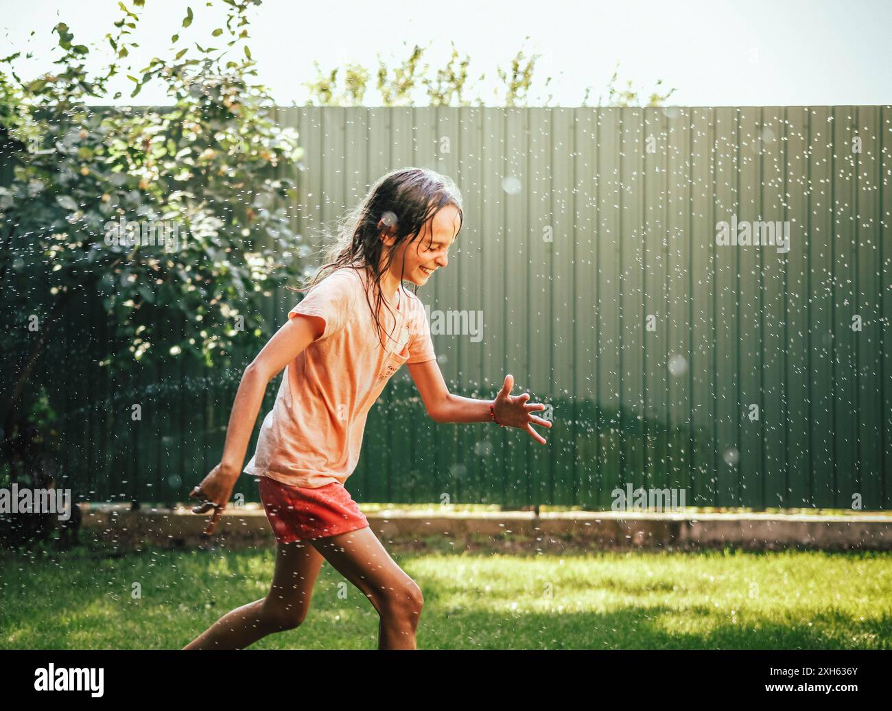 Kid happy running hi-res stock photography and images - Alamy
