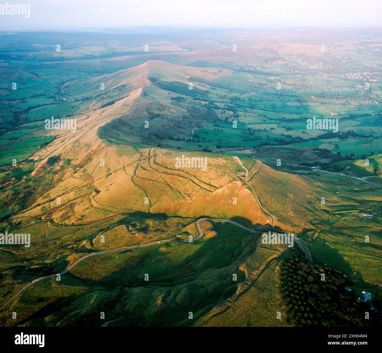 Mam Tor Prehistoric Iron Age hill fort on limestone ridge above village ...