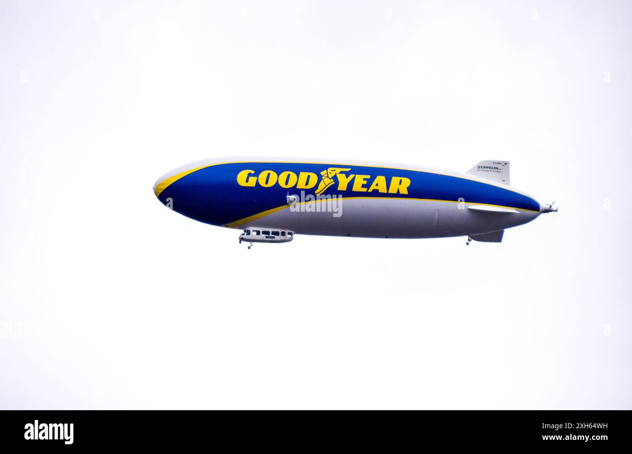 London, United Kingdom. 30th June, 2021. A Goodyear blimp flies over ...