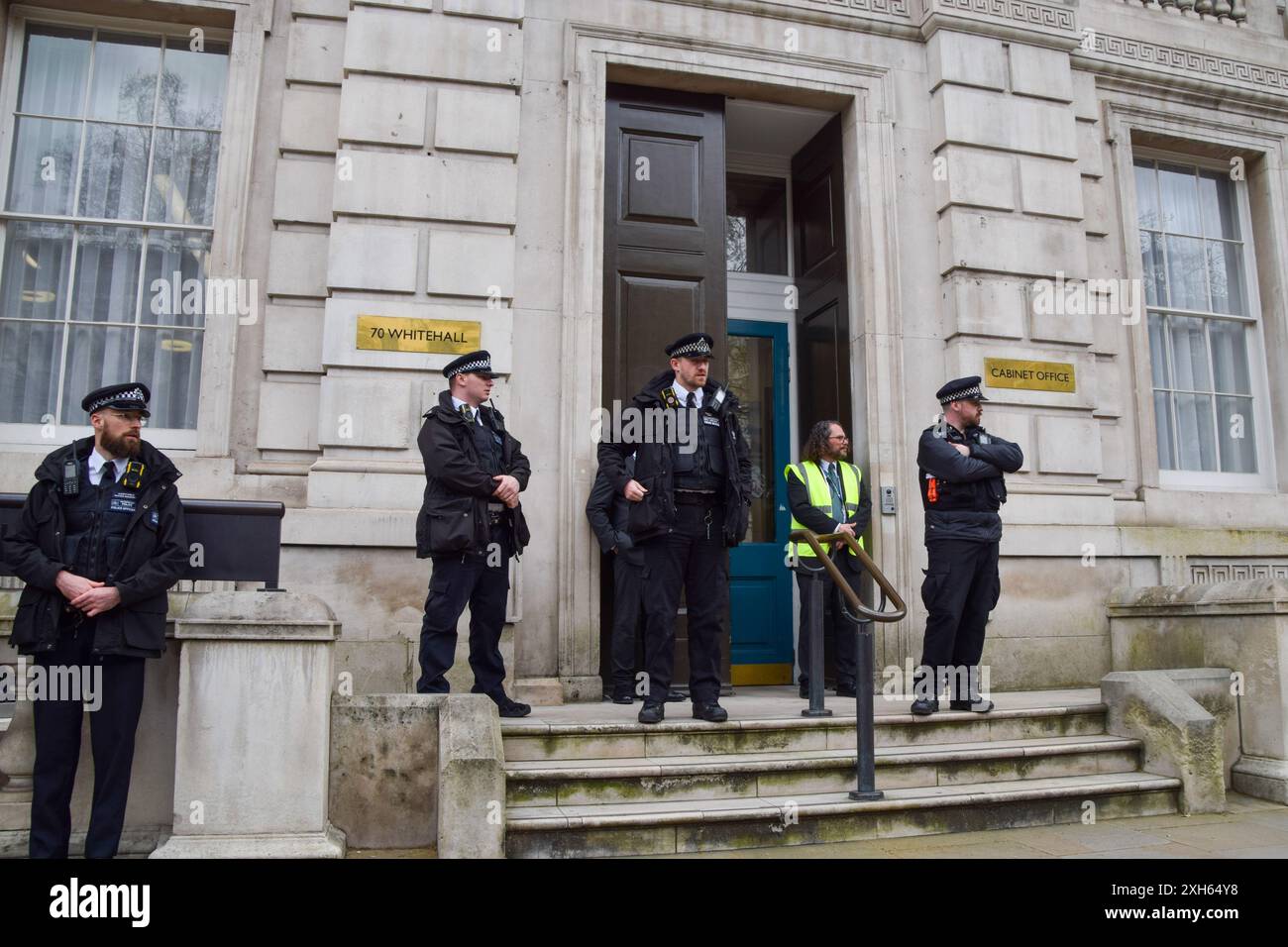 London, UK. 10th April 2024. Police officers guard the Cabinet Office ...