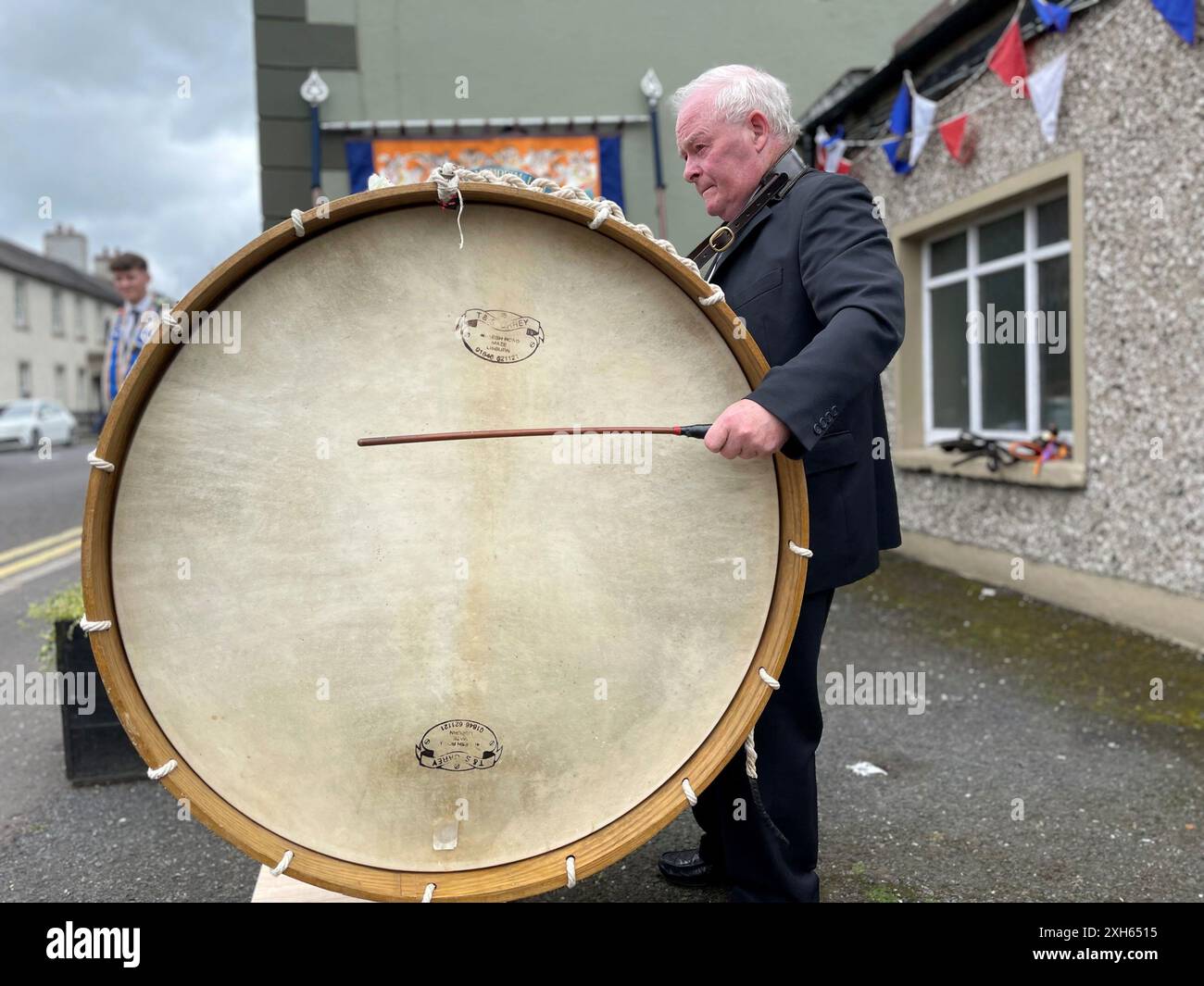 Charlie Campbell playing a a traditional Lambeg drum ahead of an Orange ...