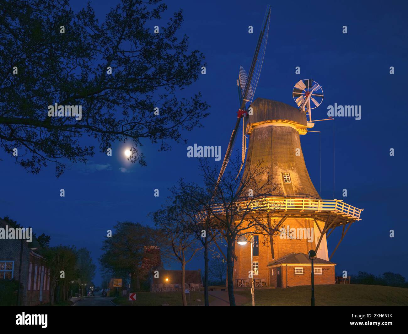 the Green Mill, one of Greetsiel's twin mills, at full moon, Germany ...